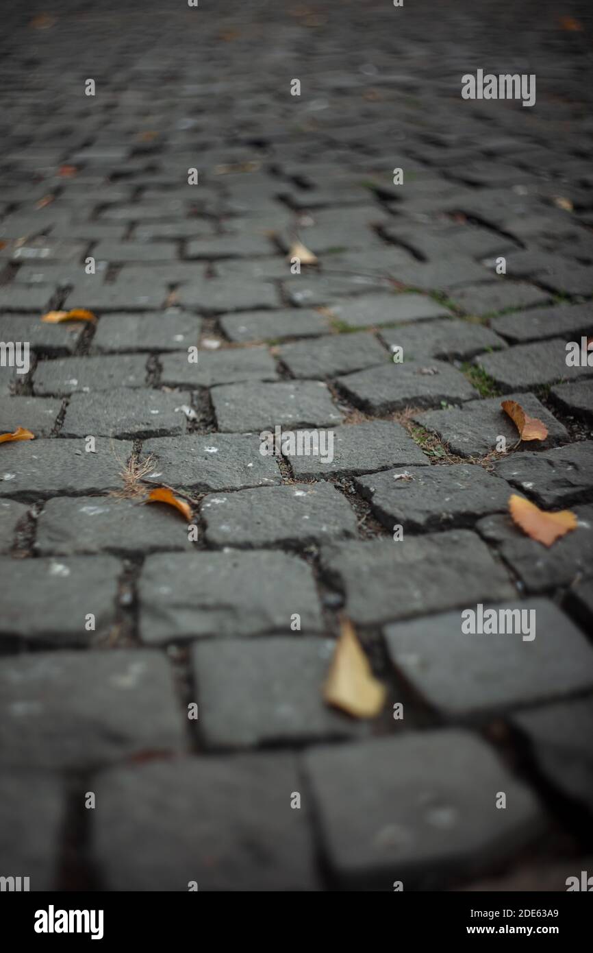 Old slab pavement for pedestrian city center. Geometrical sequence ...