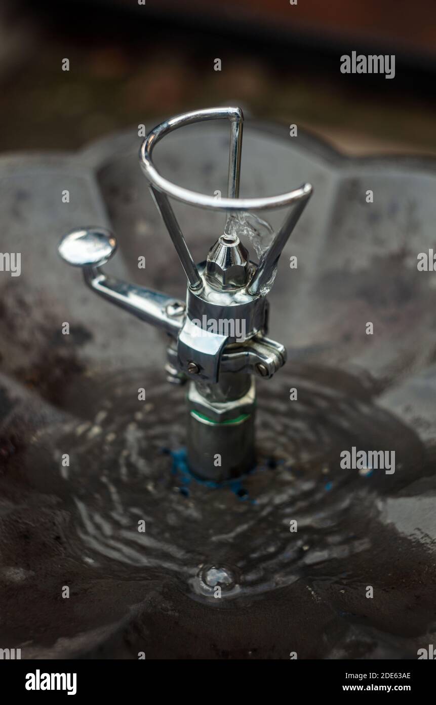 Close-up image of drinking water fountain Stock Photo - Alamy