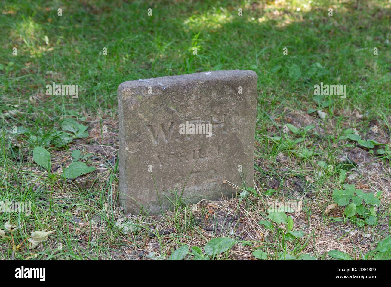 A small headstone (WFH April 1 1872) in the Burial grounds within Lucy ...