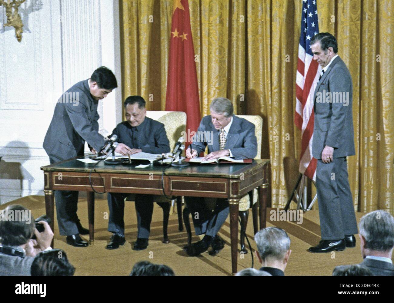 Deng Xiaoping and Jimmy Carter sign diplomatic agreements between the ...