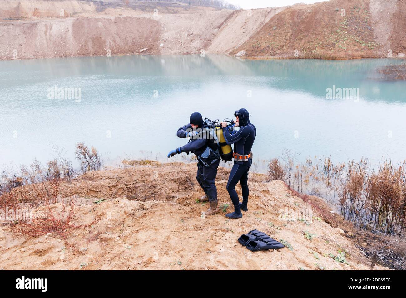 Lifeguard in a wetsuit to work underwater. Search at the bottom of the ...