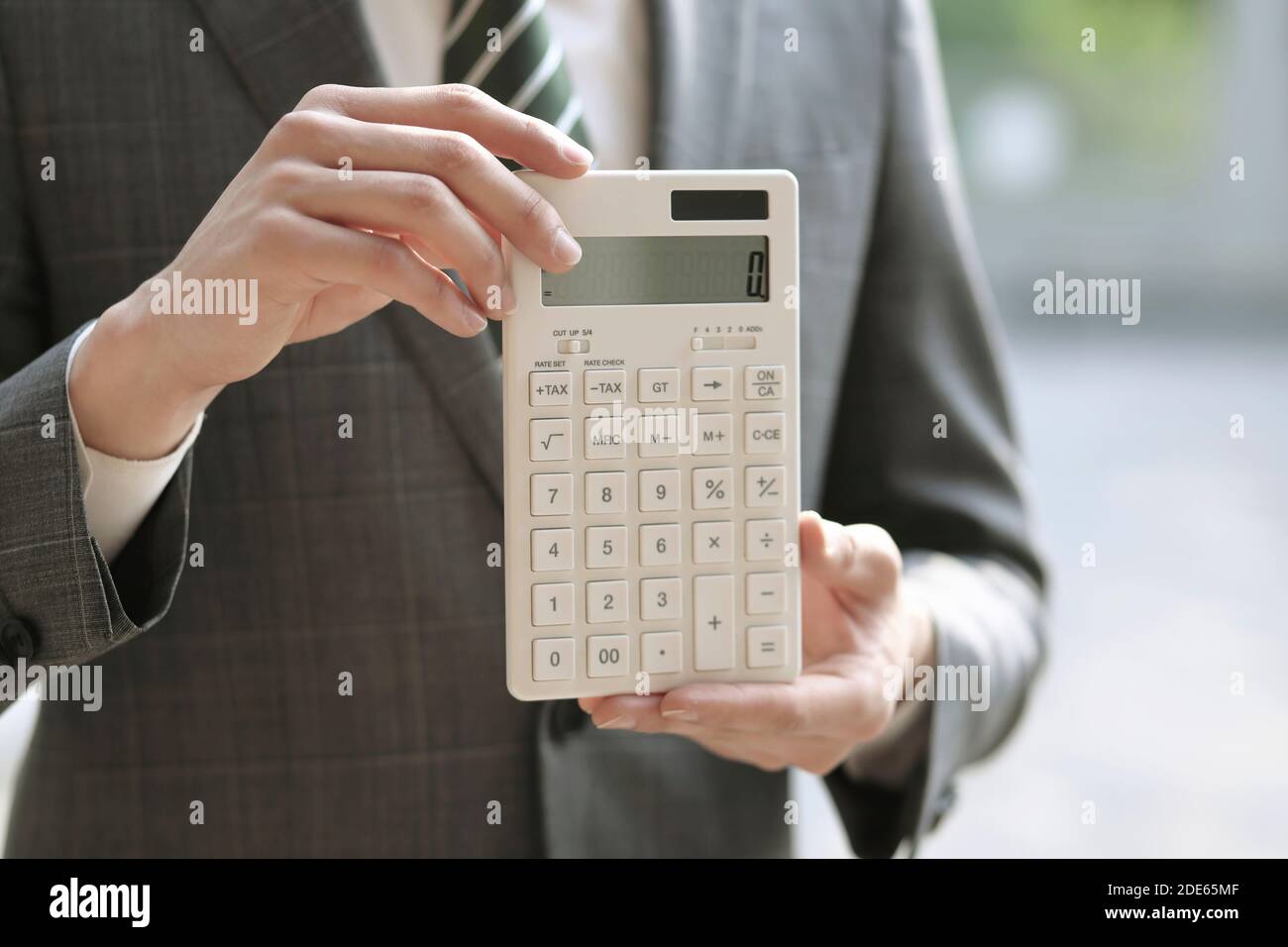 Hold calculator hi-res stock photography and images - Alamy
