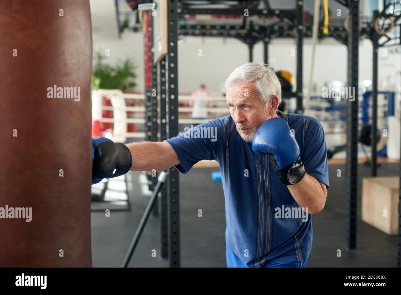 Senior caucasian man training at boxing gym Stock Photo - Alamy