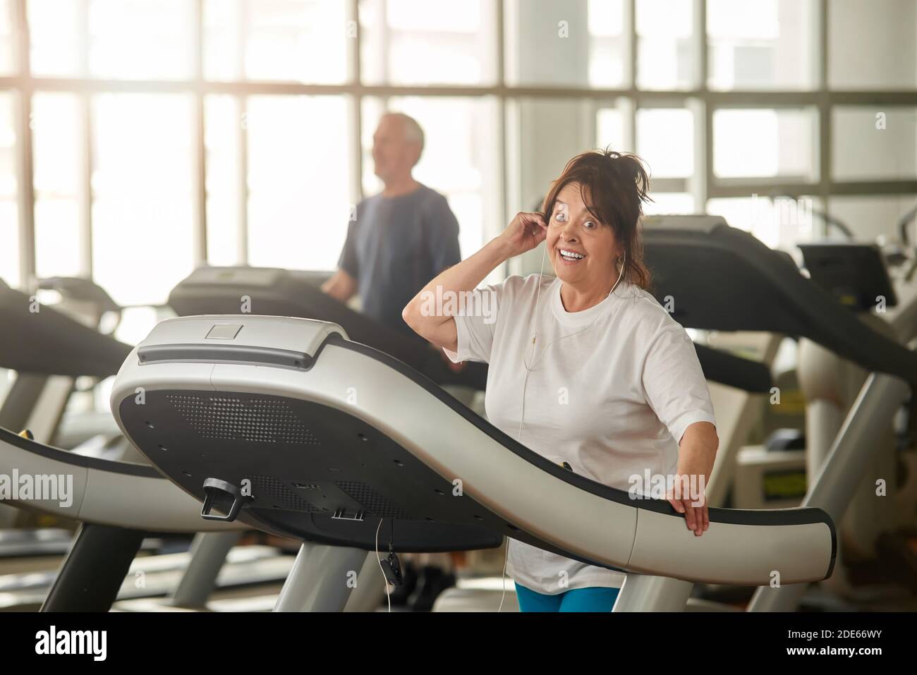 Senior woman running on treadmill hi-res stock photography and images ...