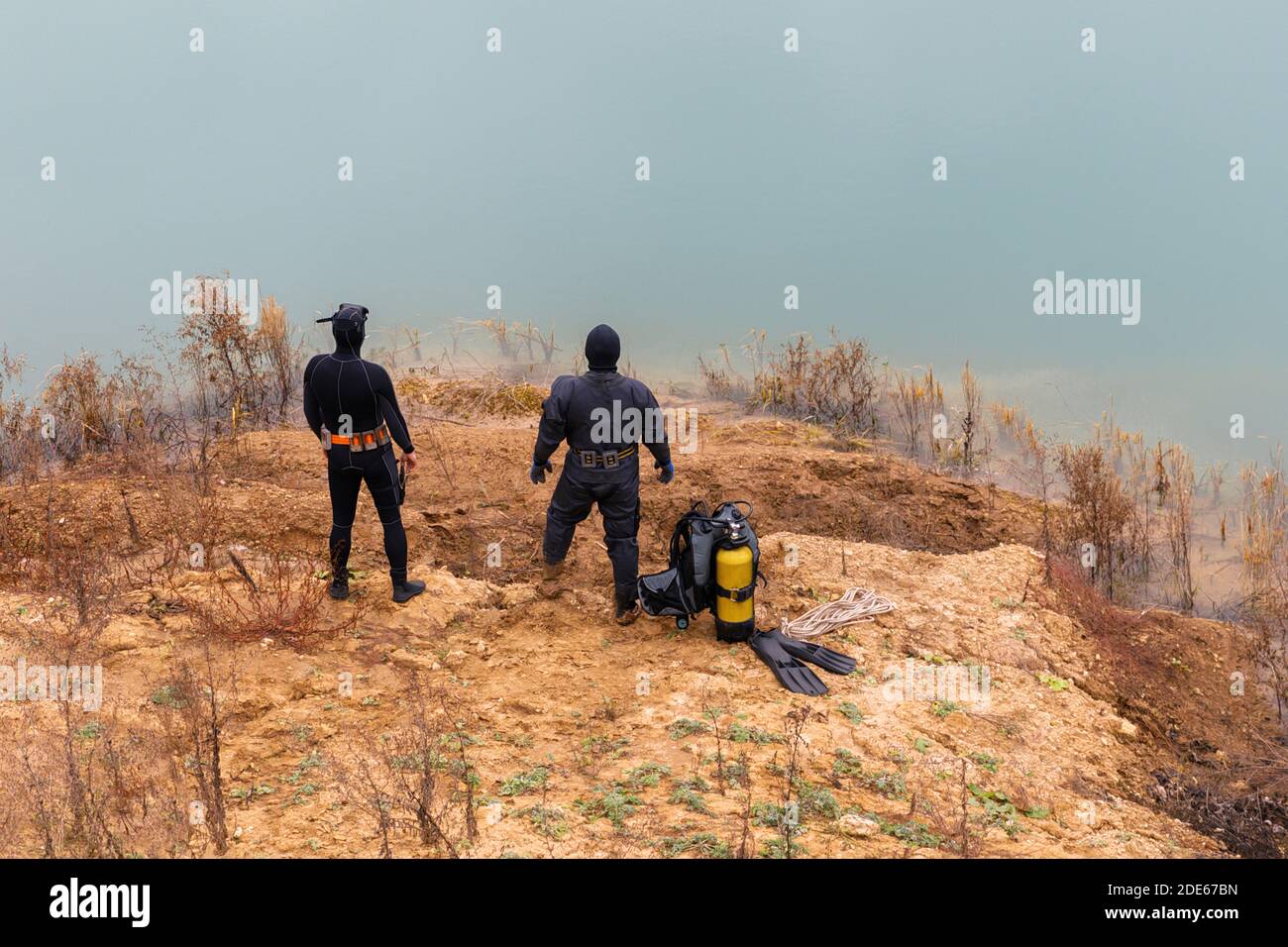 Lifeguard in a wetsuit to work underwater. Search at the bottom of the ...