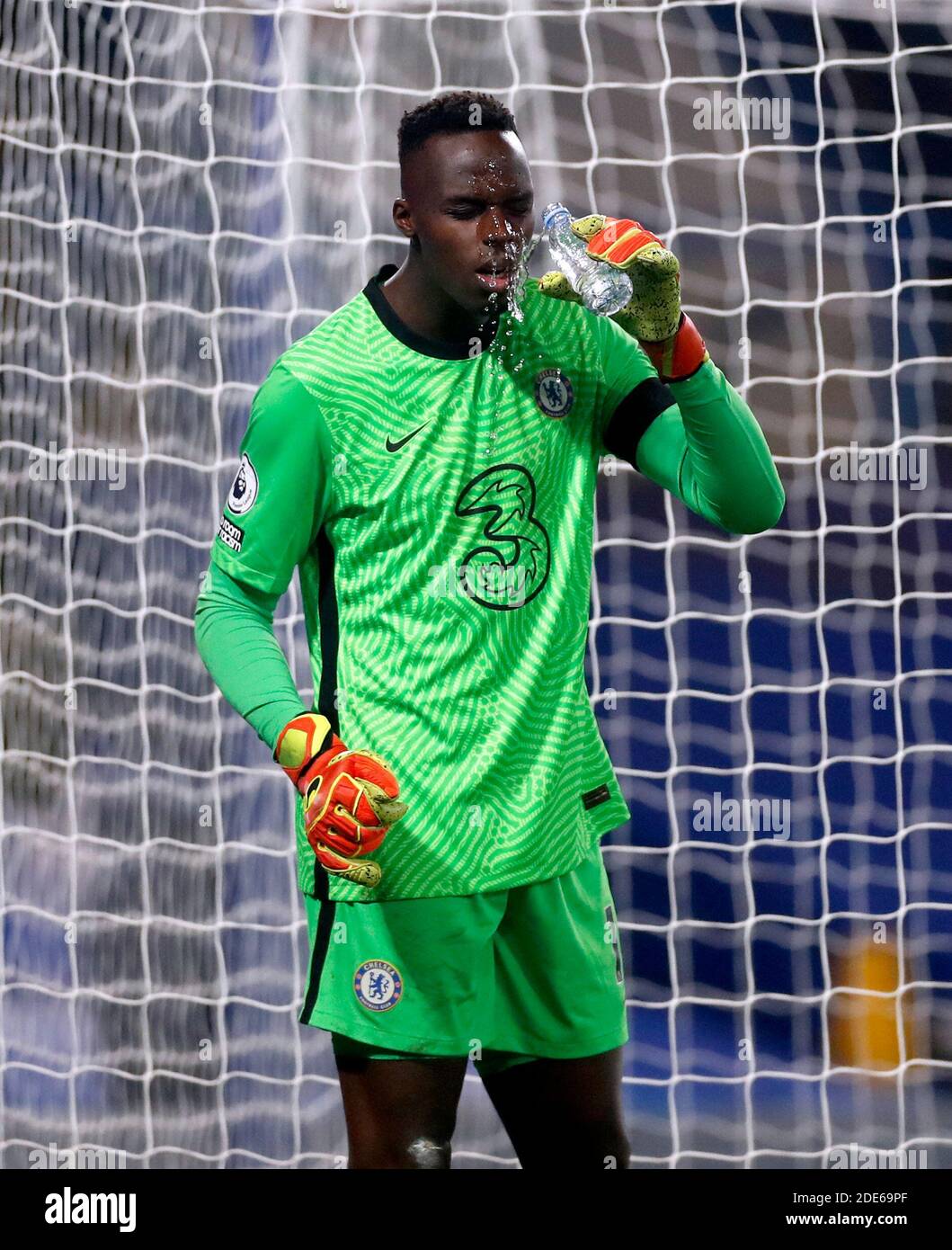 Chelsea goalkeeper Edouard Mendy cools himself down during the Premier ...