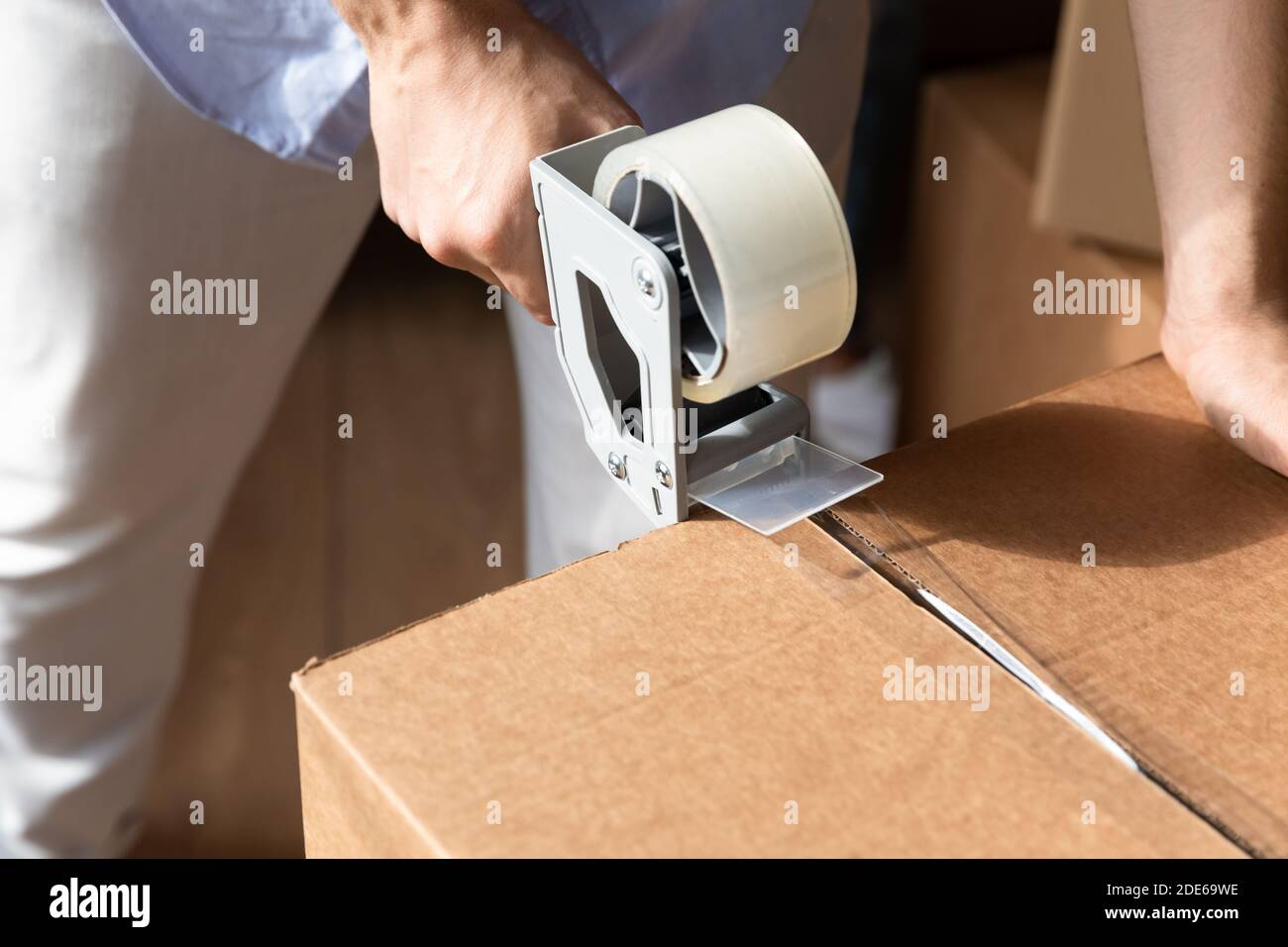 Using tape hi-res stock photography and images - Alamy