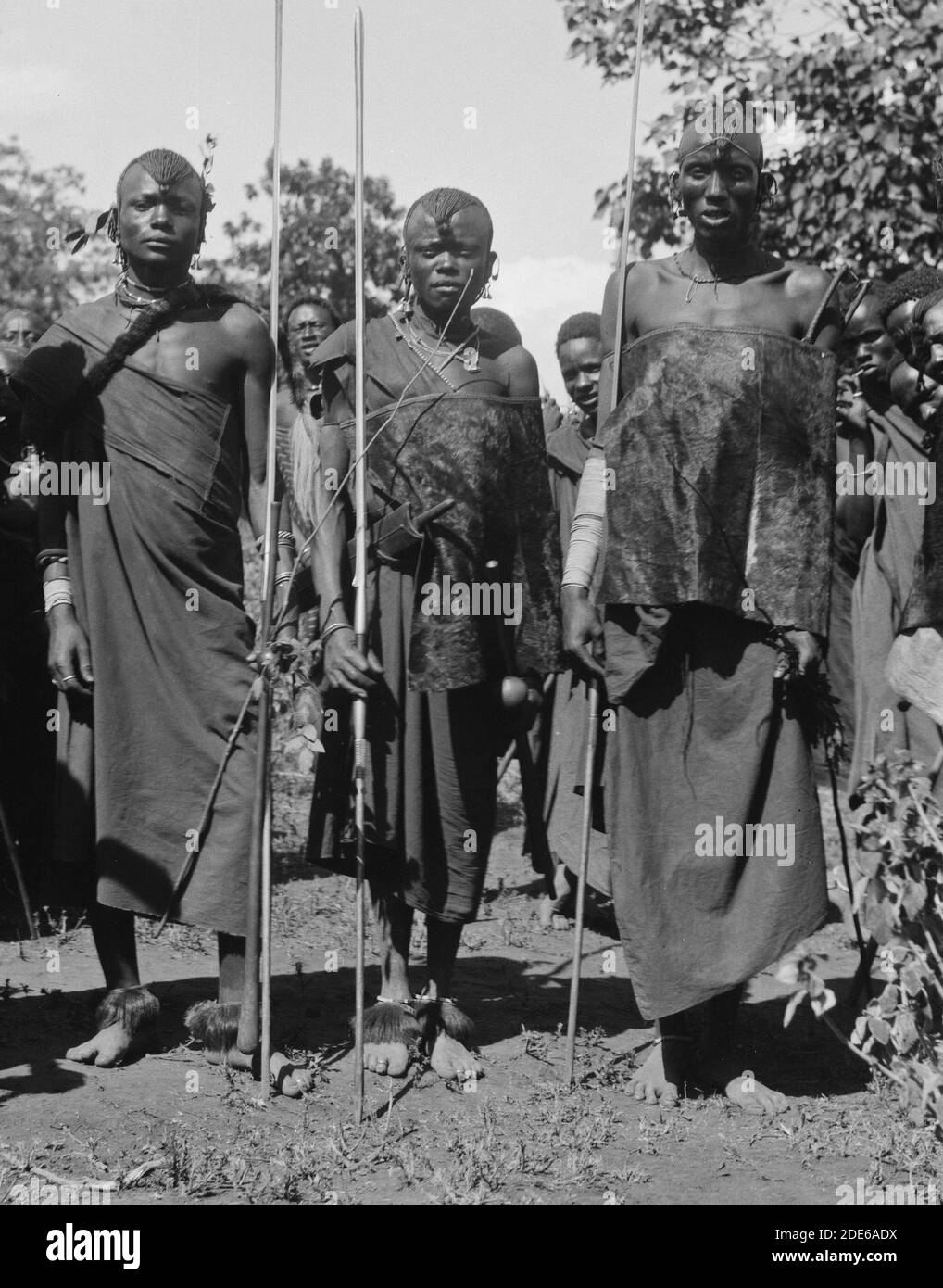 African men in traditional dress in an unknown African country during ...