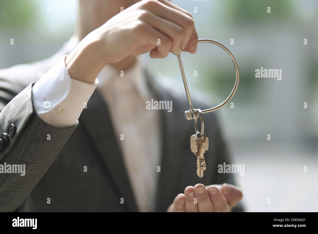 Businessman holding key hi-res stock photography and images - Alamy