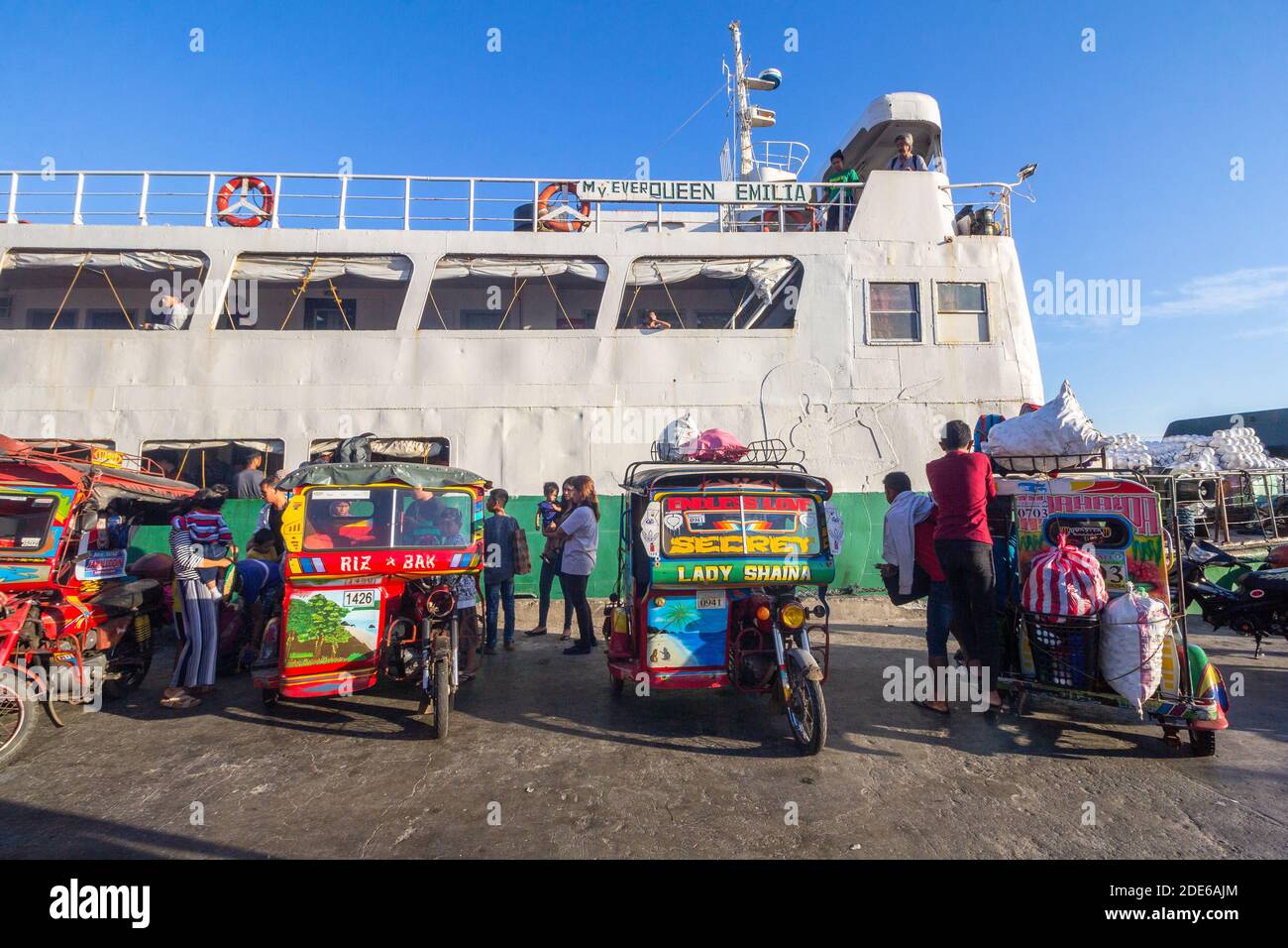Tricycles, local passenger vehicles, at the port of Bongao in Tawitawi ...