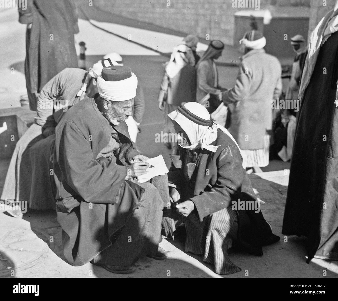 Middle East History - Sheik helping peasant to fill out ap[p]lication ...