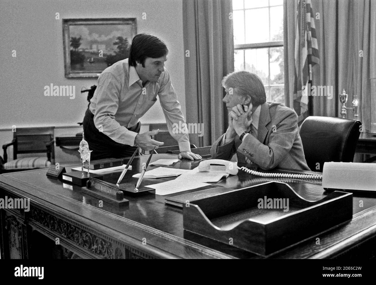 Hamilton Jordan consults with Jimmy Carter in the Oval Office. ca. 24 ...