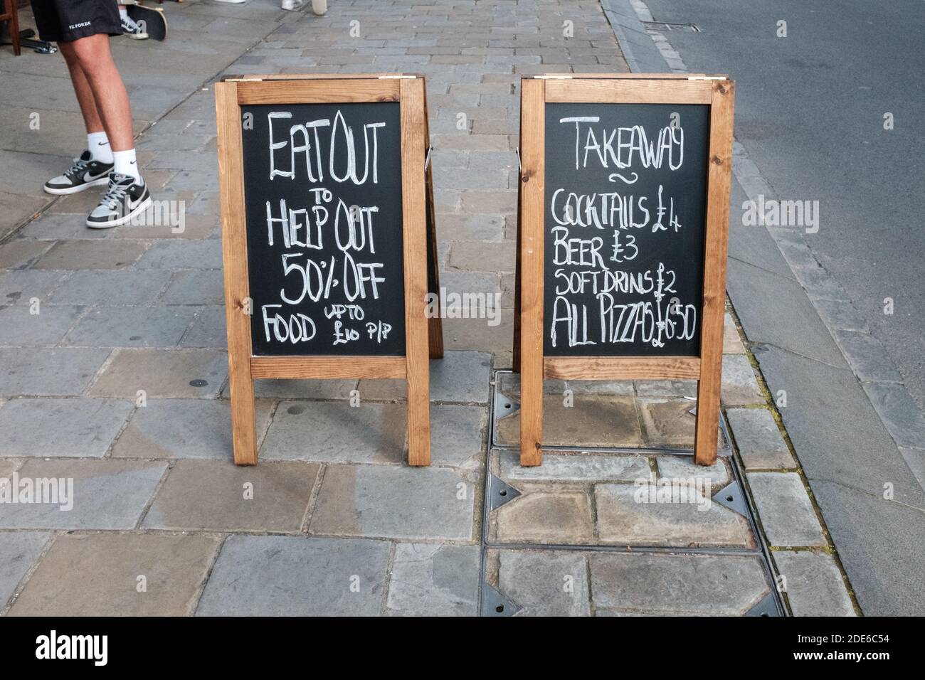 “Eat out and help out” restaurant signs on the street during summer ...