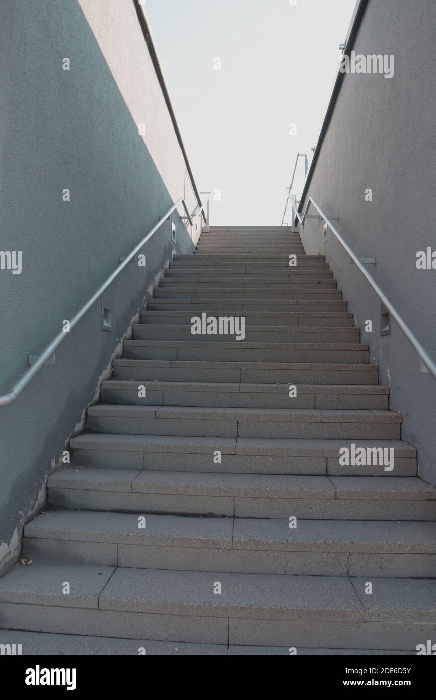 stairs outside the building with metal handrail left and right view to ...