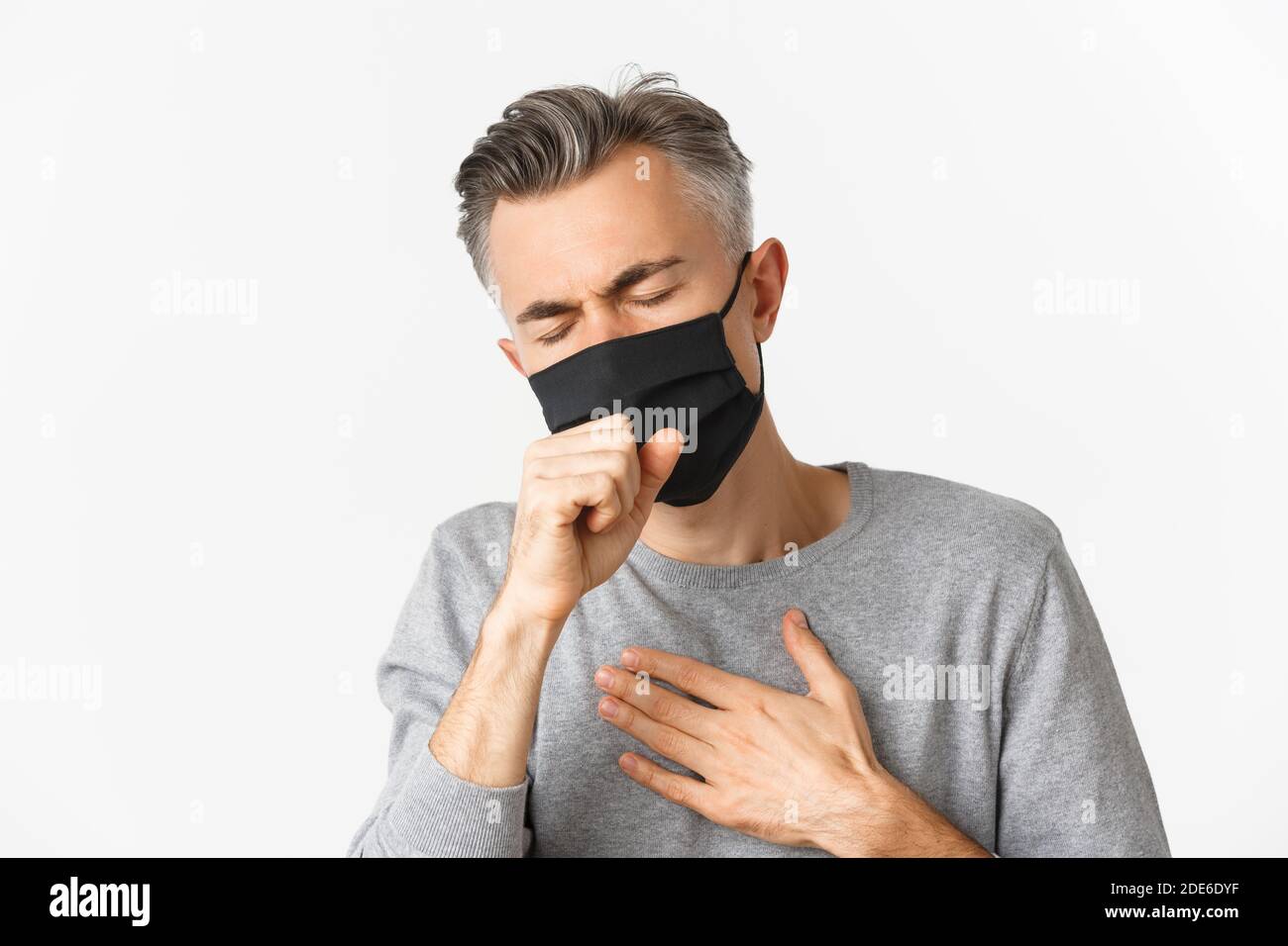 Coughing middle aged man feeling hi-res stock photography and images ...