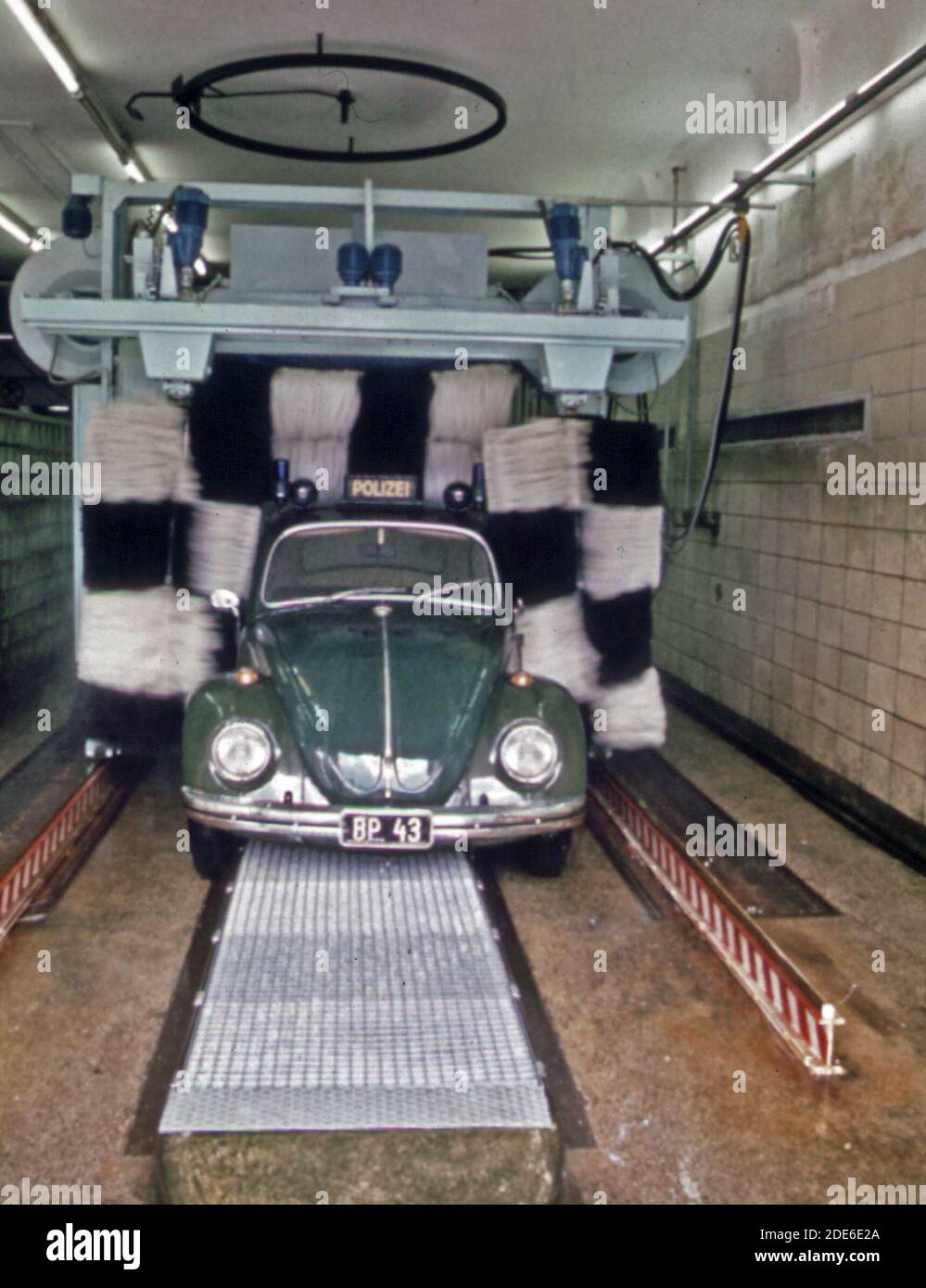 A police Volkswagon comes through the automatic washer at police ...