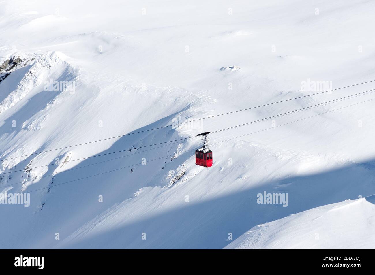 Cable car in winter alpine landscape Stock Photo - Alamy
