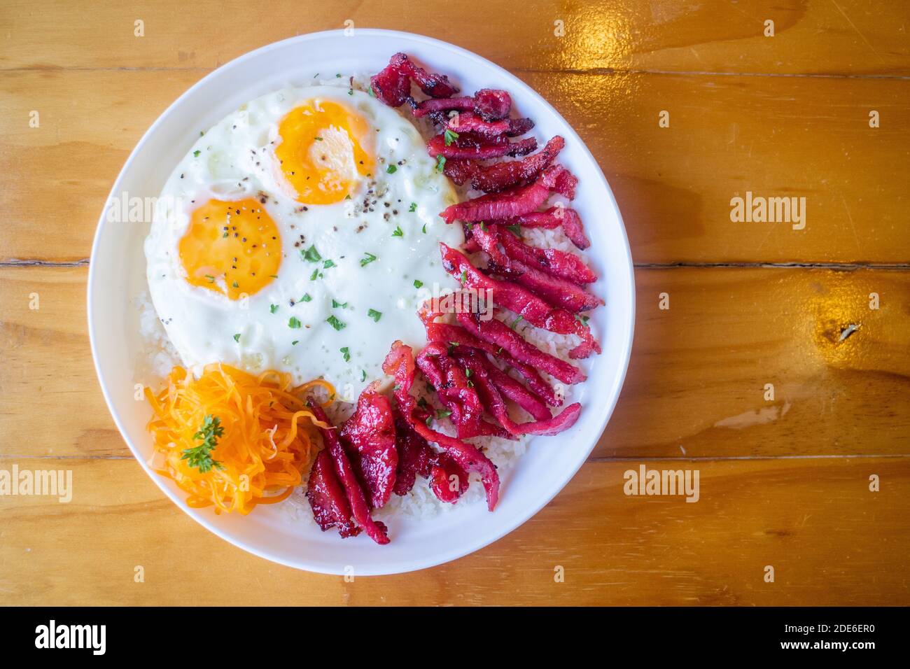 Tocilog, a popular traditional breakfast food in the Philippines Stock ...