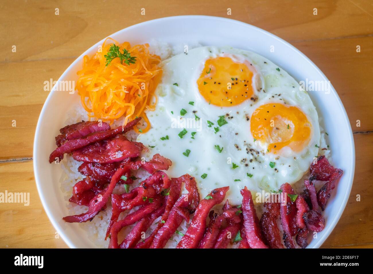 Tocilog, a popular traditional breakfast food in the Philippines Stock ...