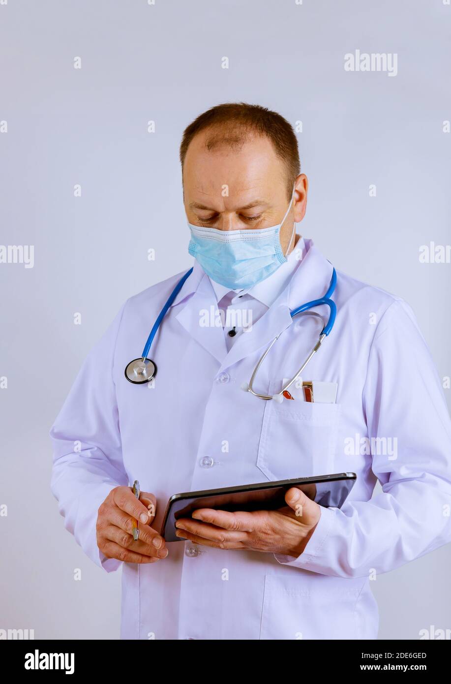 Clinic emergency hospital doctor at work physician using digital tablet ...