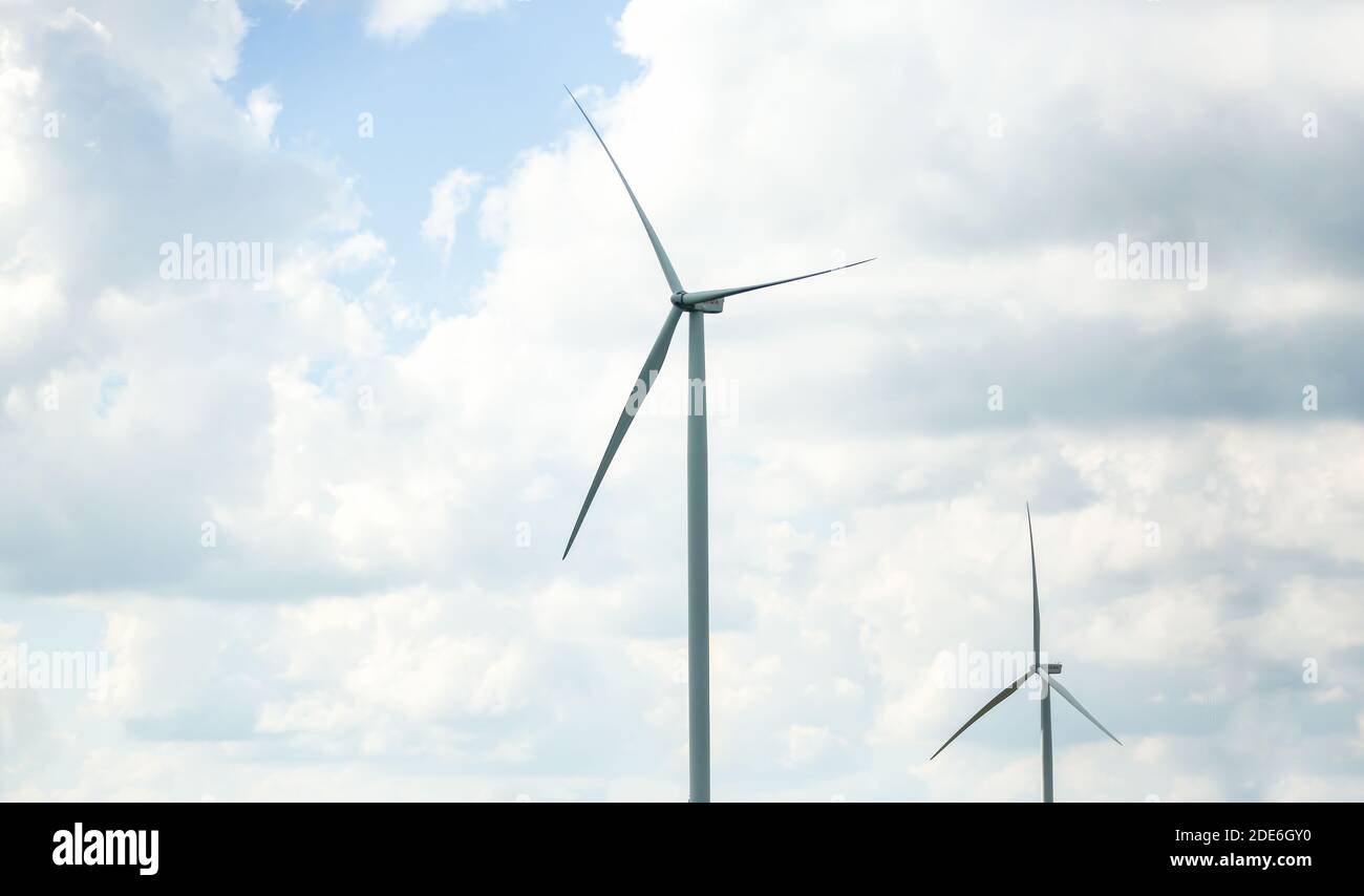 clean energy power concept, wind turbine and cloud sky Stock Photo - Alamy