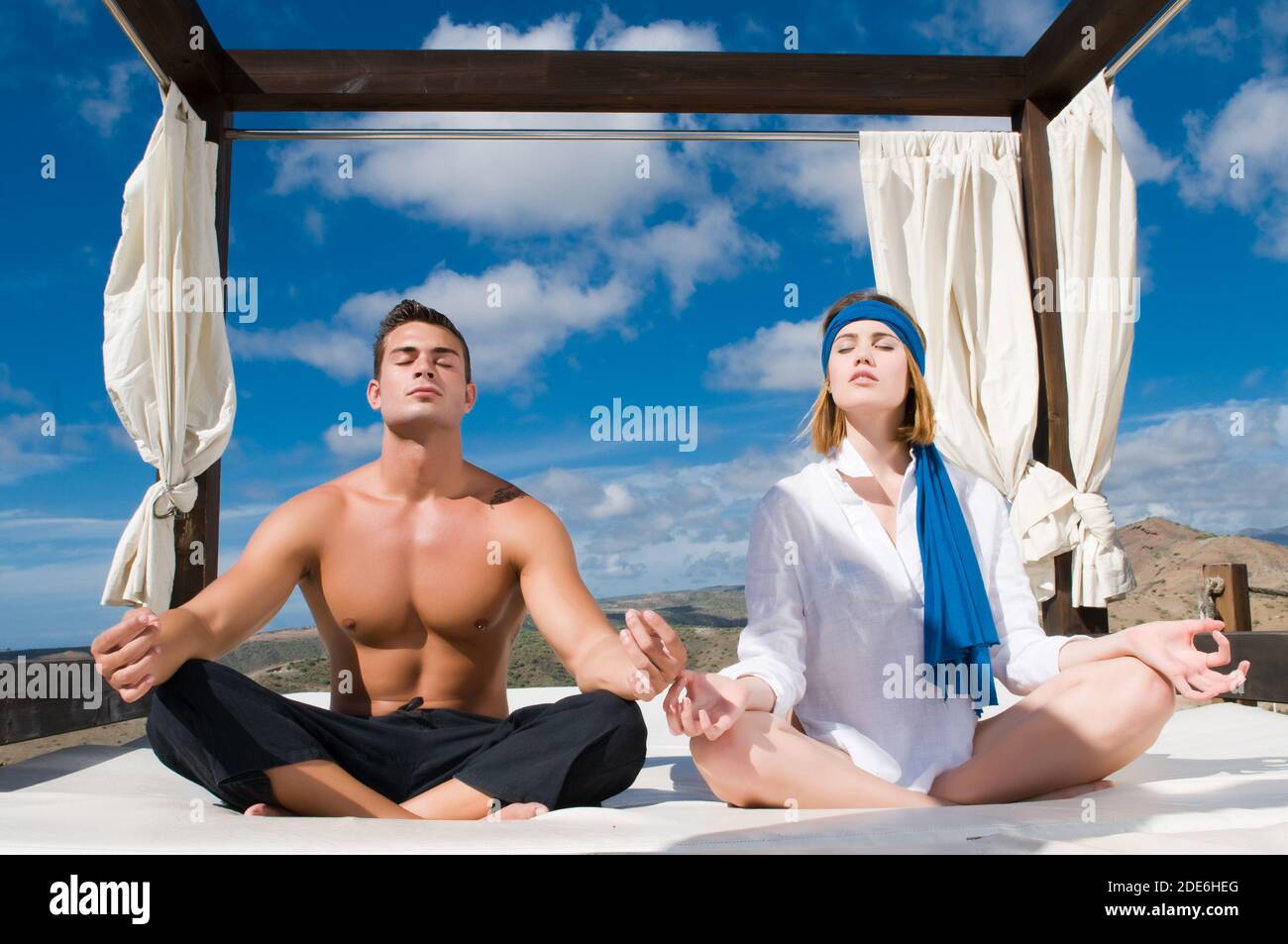Portrait happy senior couple meditating hi-res stock photography and ...