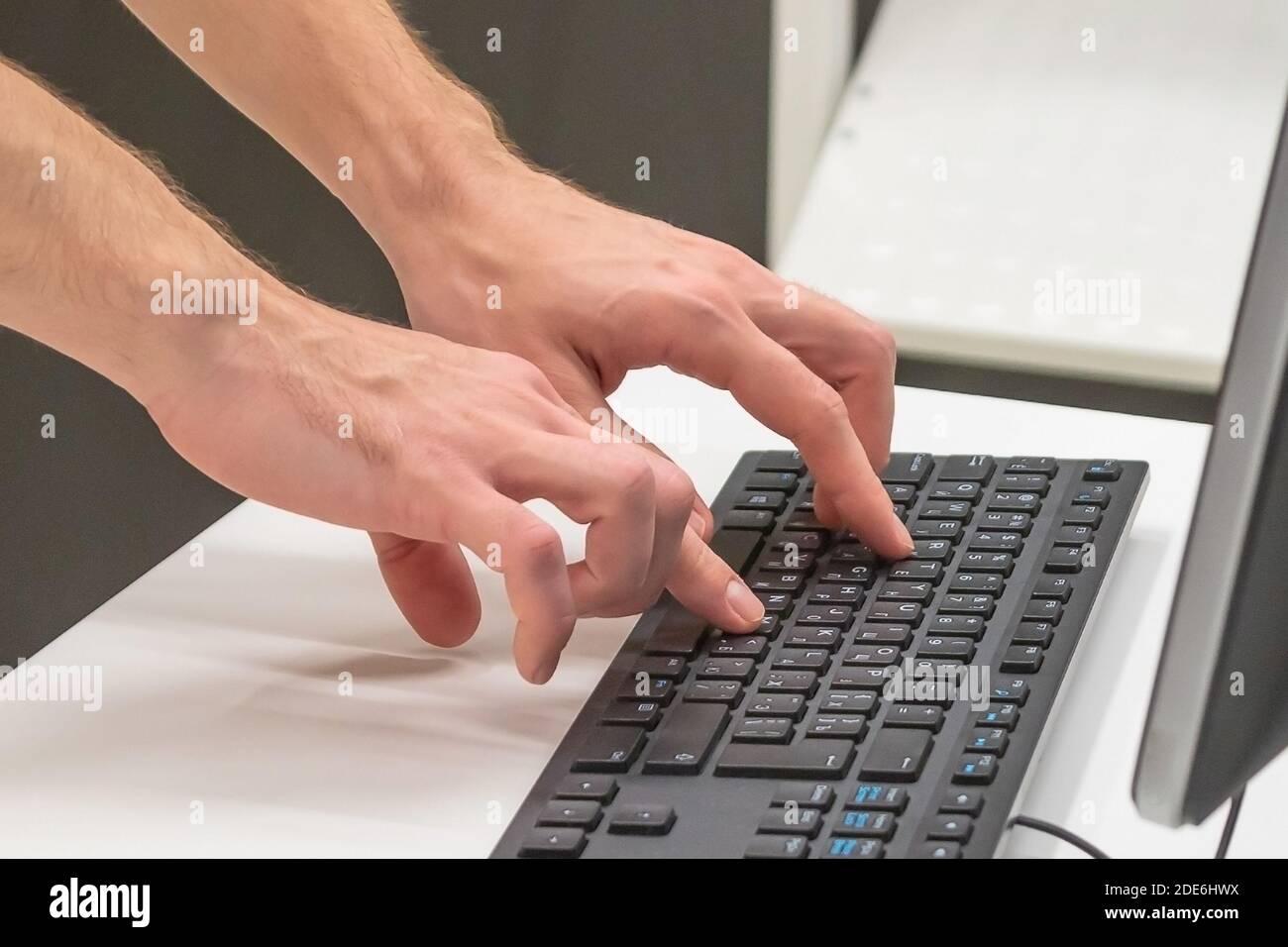 Black male hands typing hi-res stock photography and images - Alamy