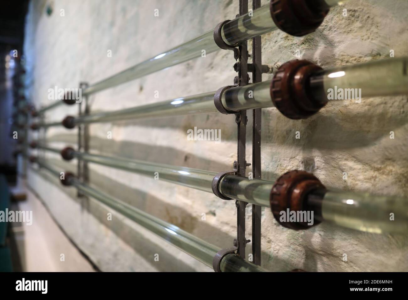 Details of glass wine pipe at the winery Stock Photo - Alamy