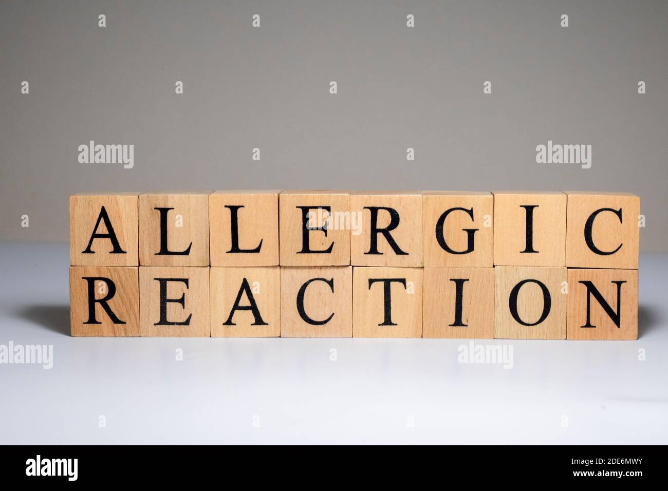 Reaction Word In Wooden Cube Stock Photo - Alamy