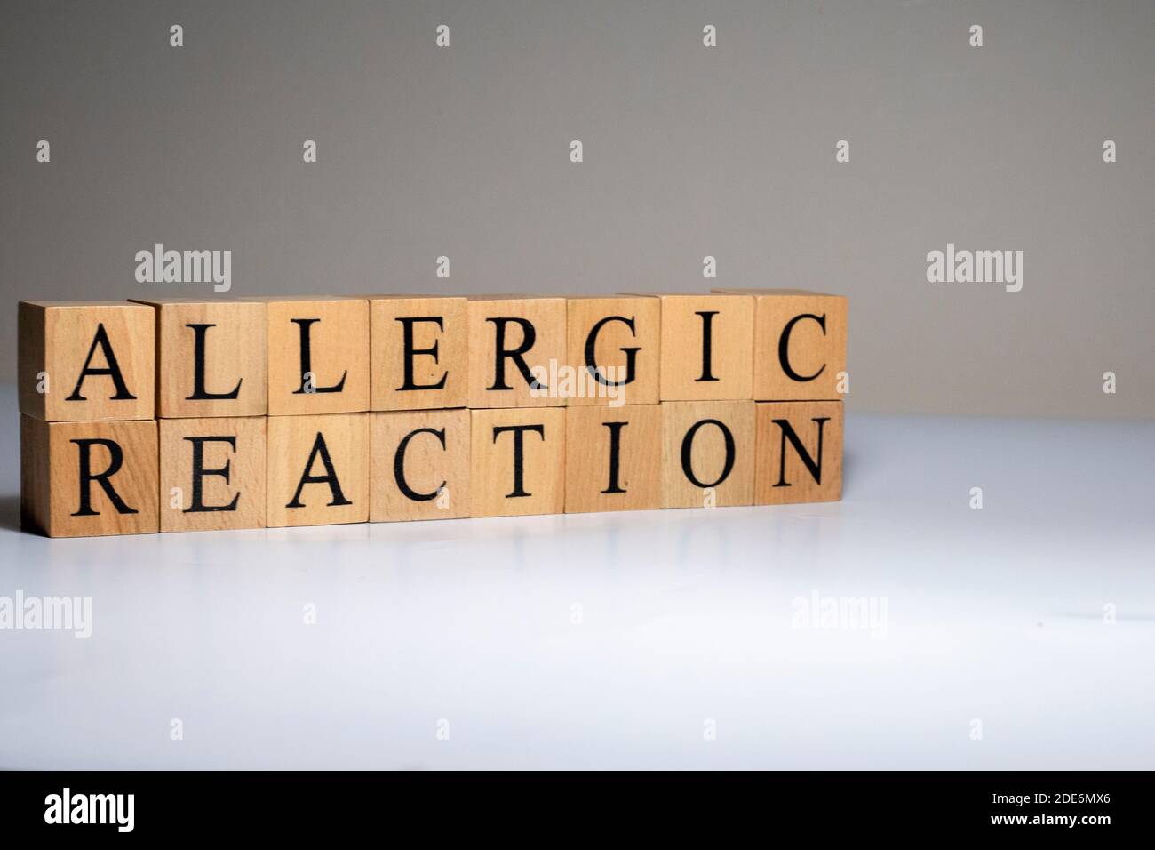 Reaction Word In Wooden Cube Stock Photo - Alamy