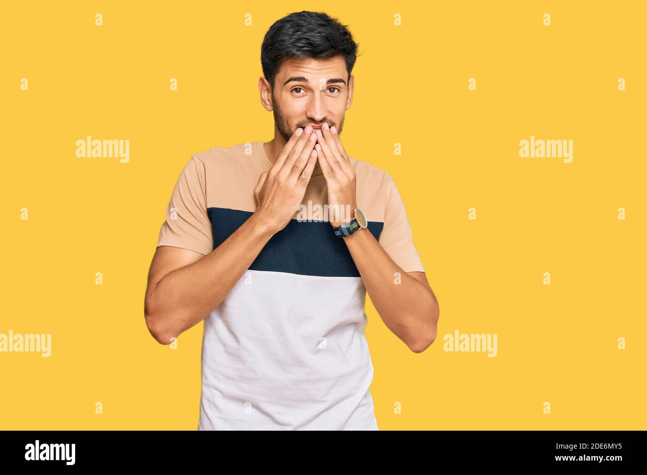 Young handsome man wearing casual clothes laughing and embarrassed ...