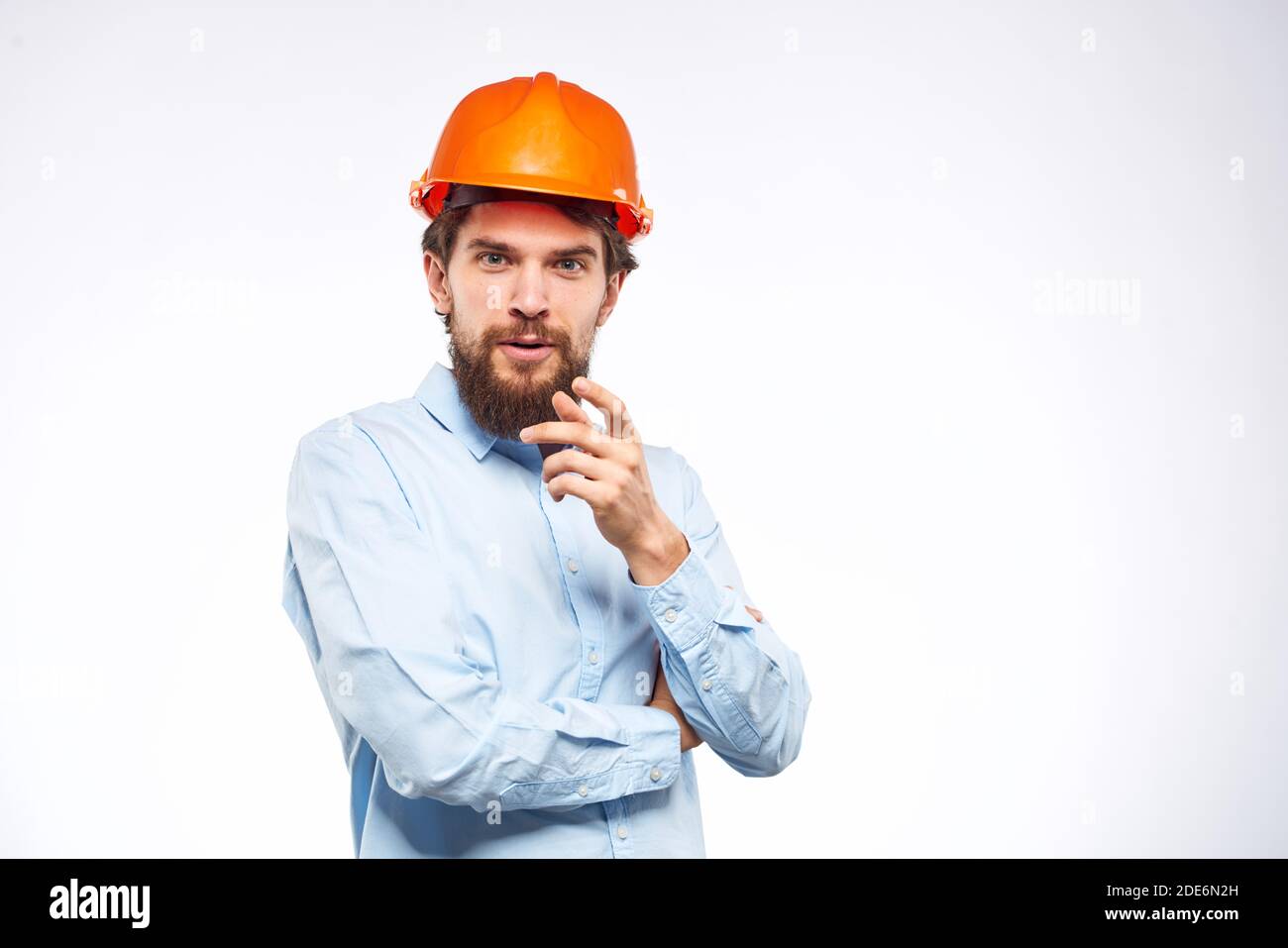 Worker man in orange paint engineer emotions industry construction ...