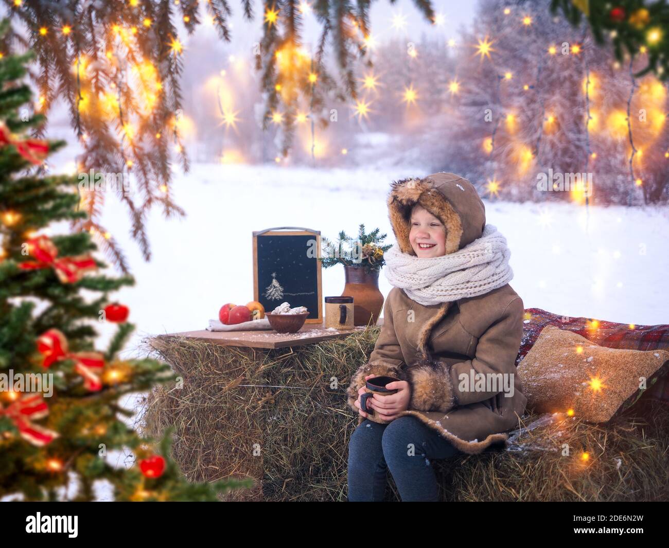Christmas winter picnic in nature. Happy child Stock Photo - Alamy