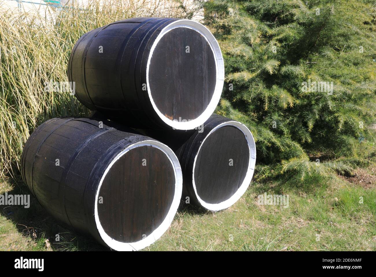 View of three wine barrels outdoor in spring Stock Photo - Alamy