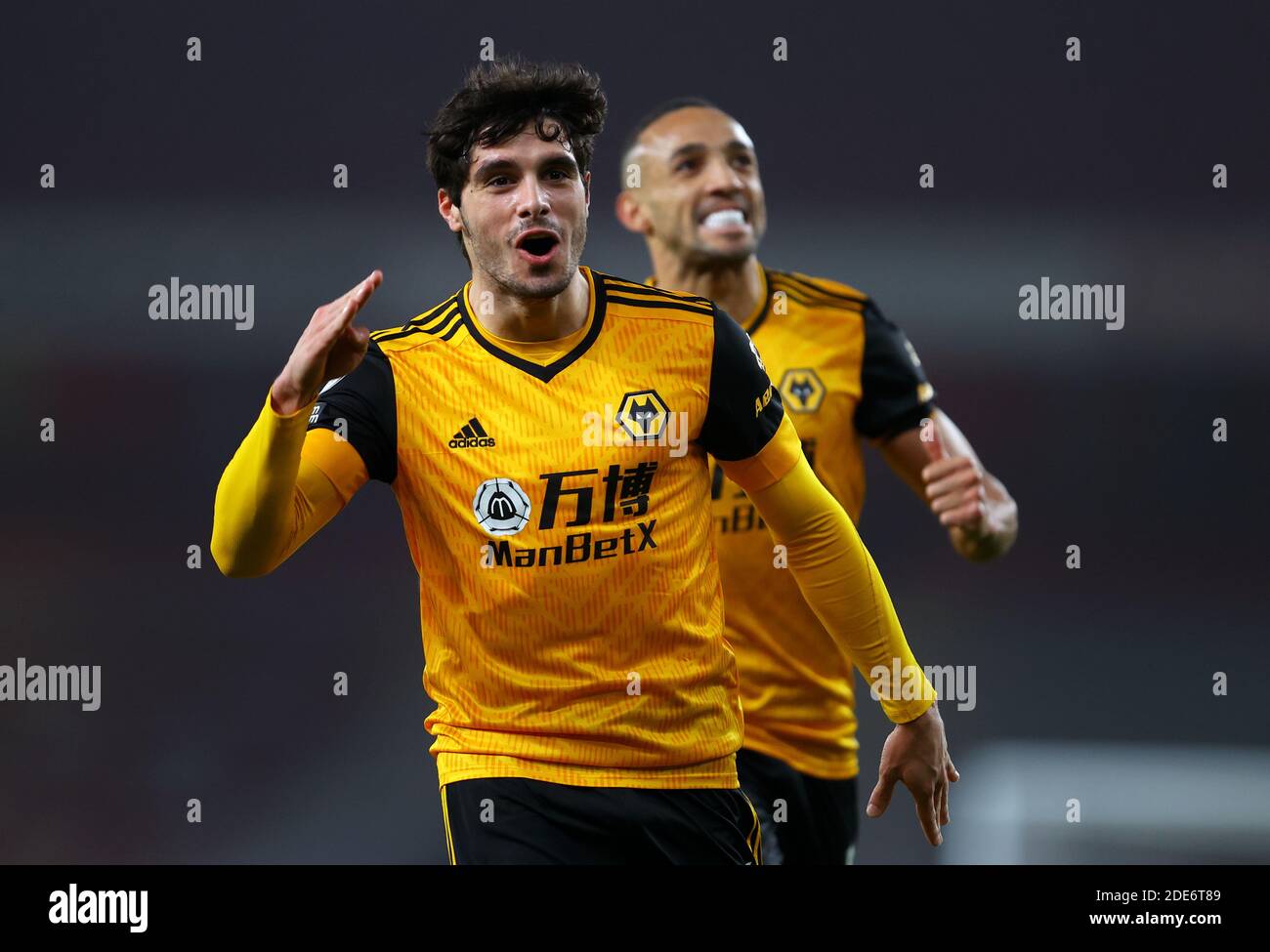 Wolverhampton Wanderers' Pedro Neto (left) celebrates scoring his side ...