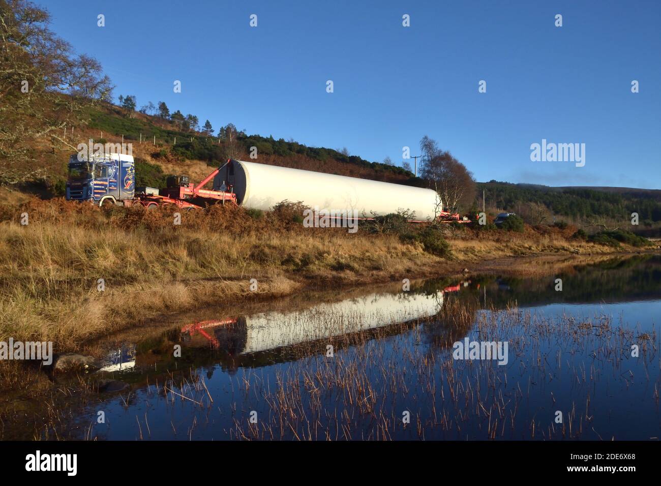 A lorry delivering a large component for a tubular steel wind turbine ...