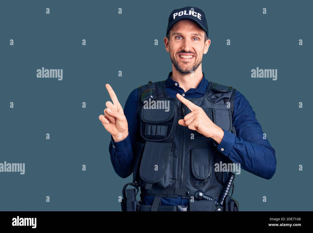 Police officer smiling at camera hi-res stock photography and images ...