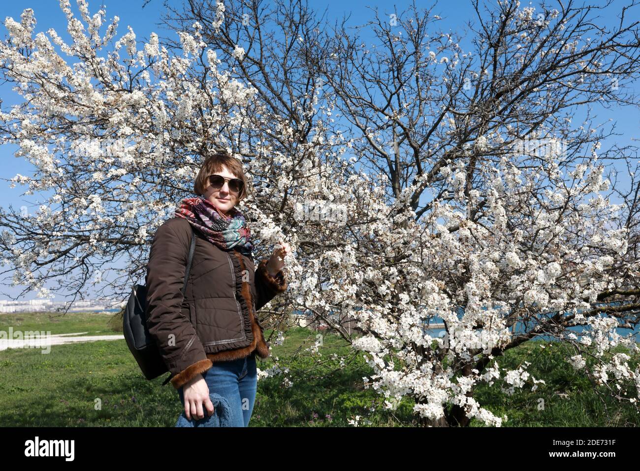 Beauty spring woman smelling apple hi-res stock photography and images ...