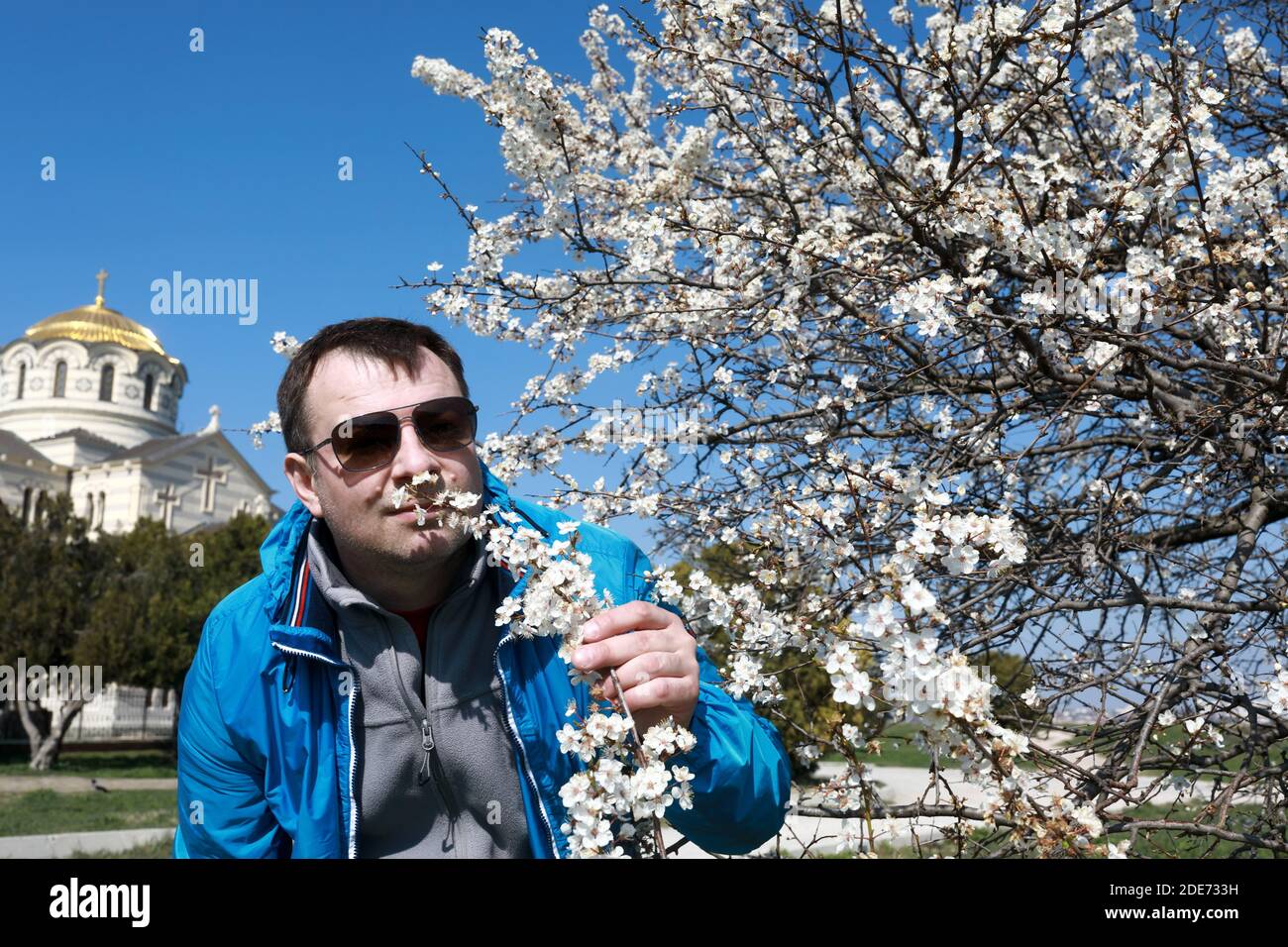 Man smelling apple tree hi-res stock photography and images - Alamy