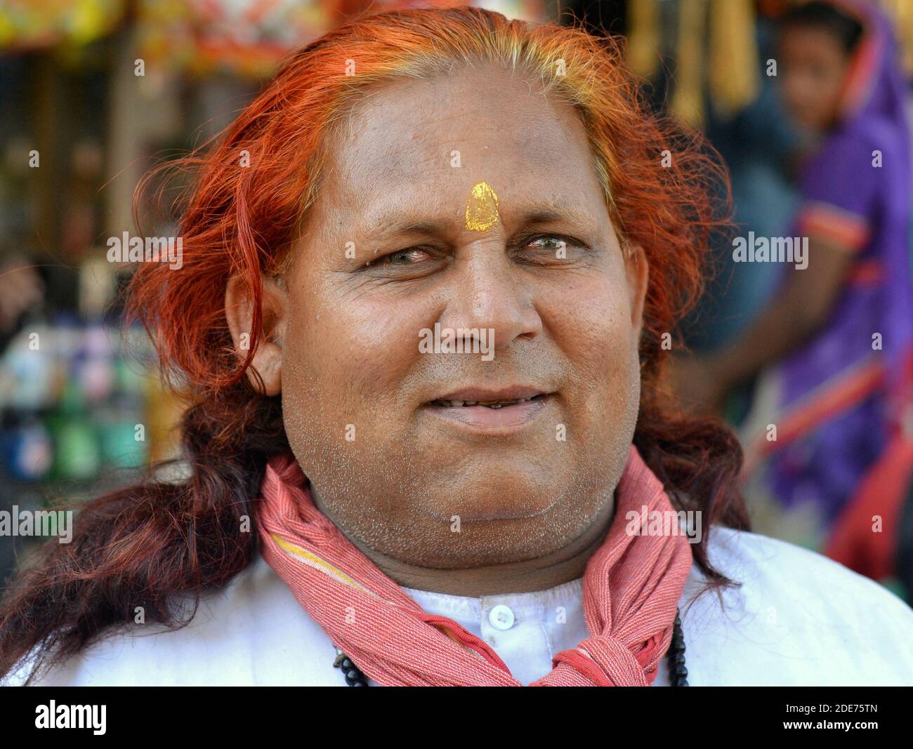 Corpulent middle-aged male Indian Hindu devotee and pilgrim with long ...