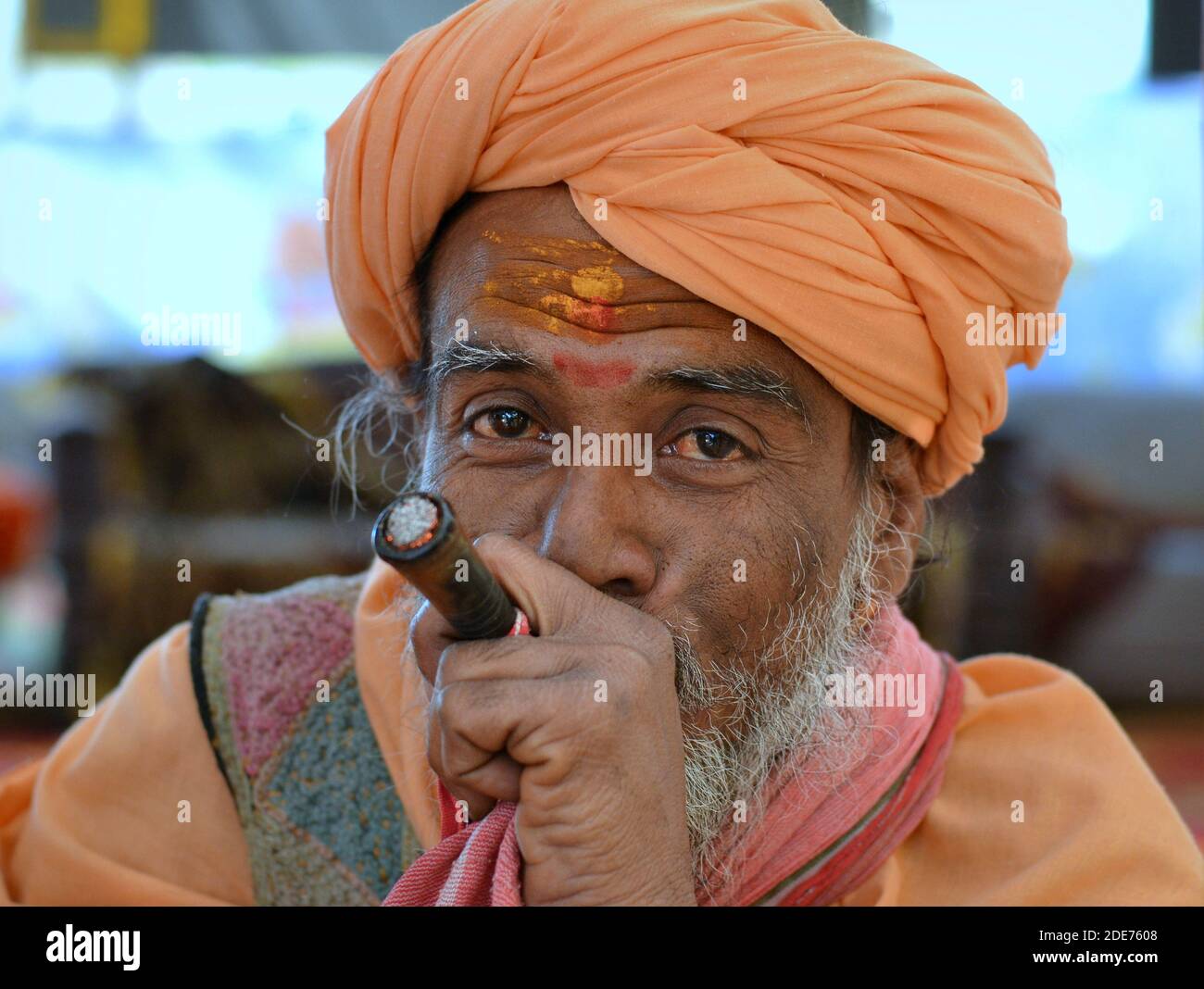 Elderly Indian Hindu devotee (sadhu, baba, guru) with tilaka marks on ...