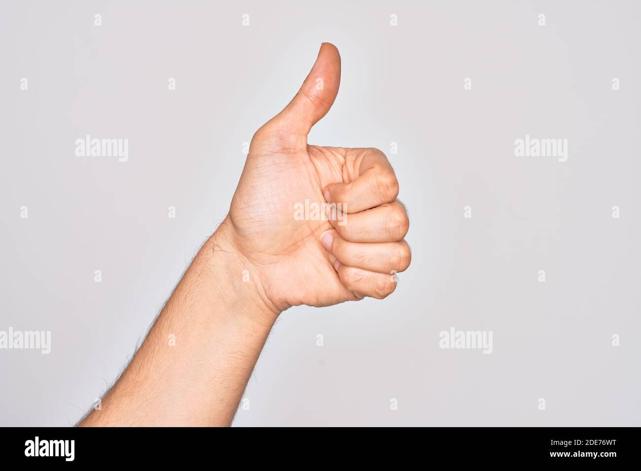 Hand of caucasian young man showing fingers over isolated white ...