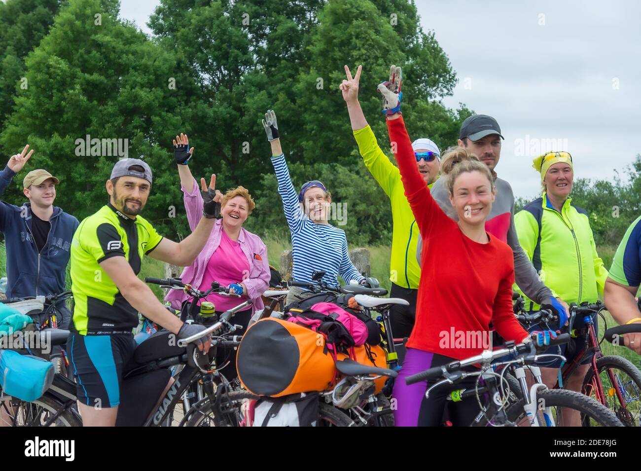 Friends cycle wave hi-res stock photography and images - Alamy