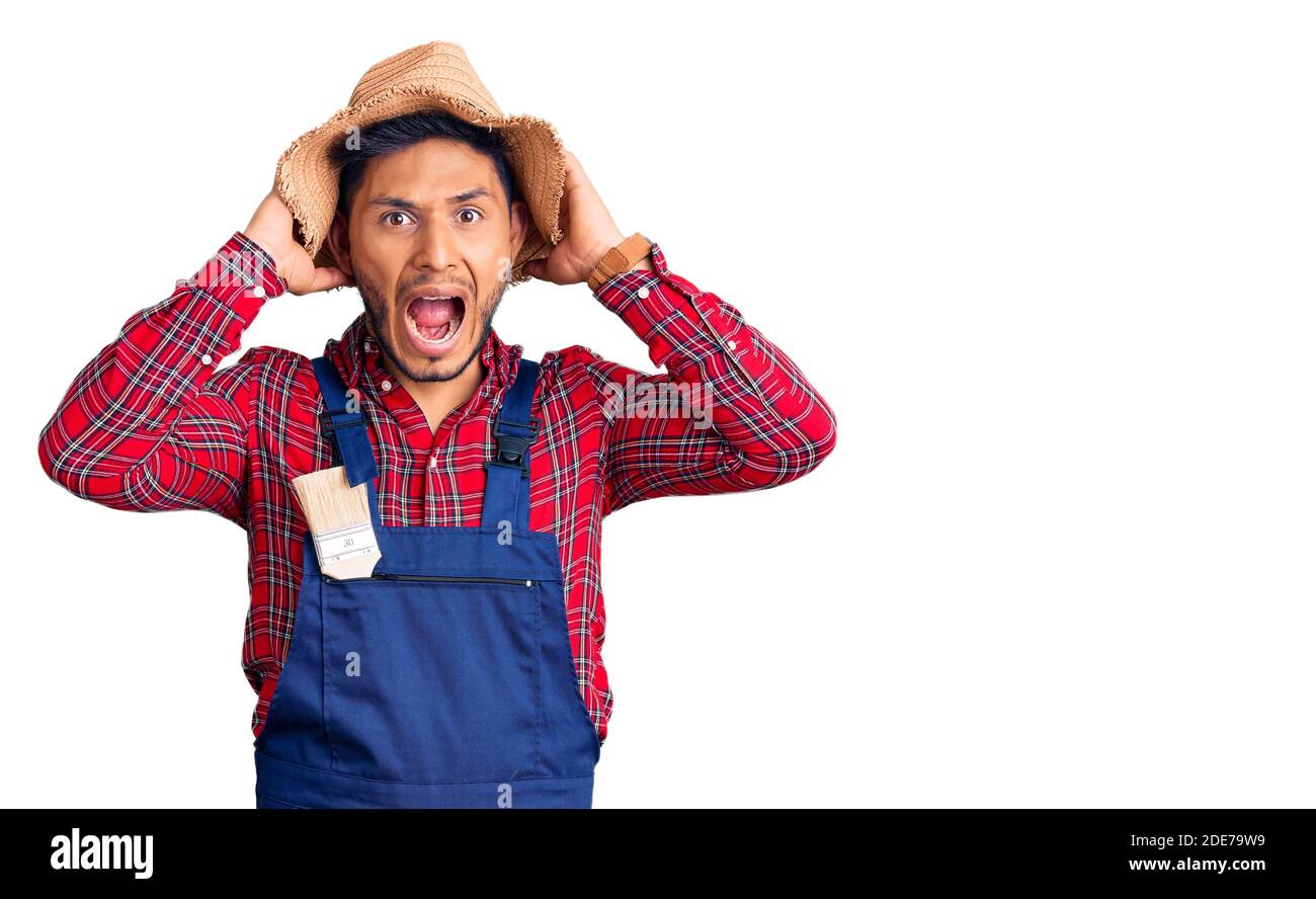 Scared man holding head Cut Out Stock Images & Pictures - Alamy