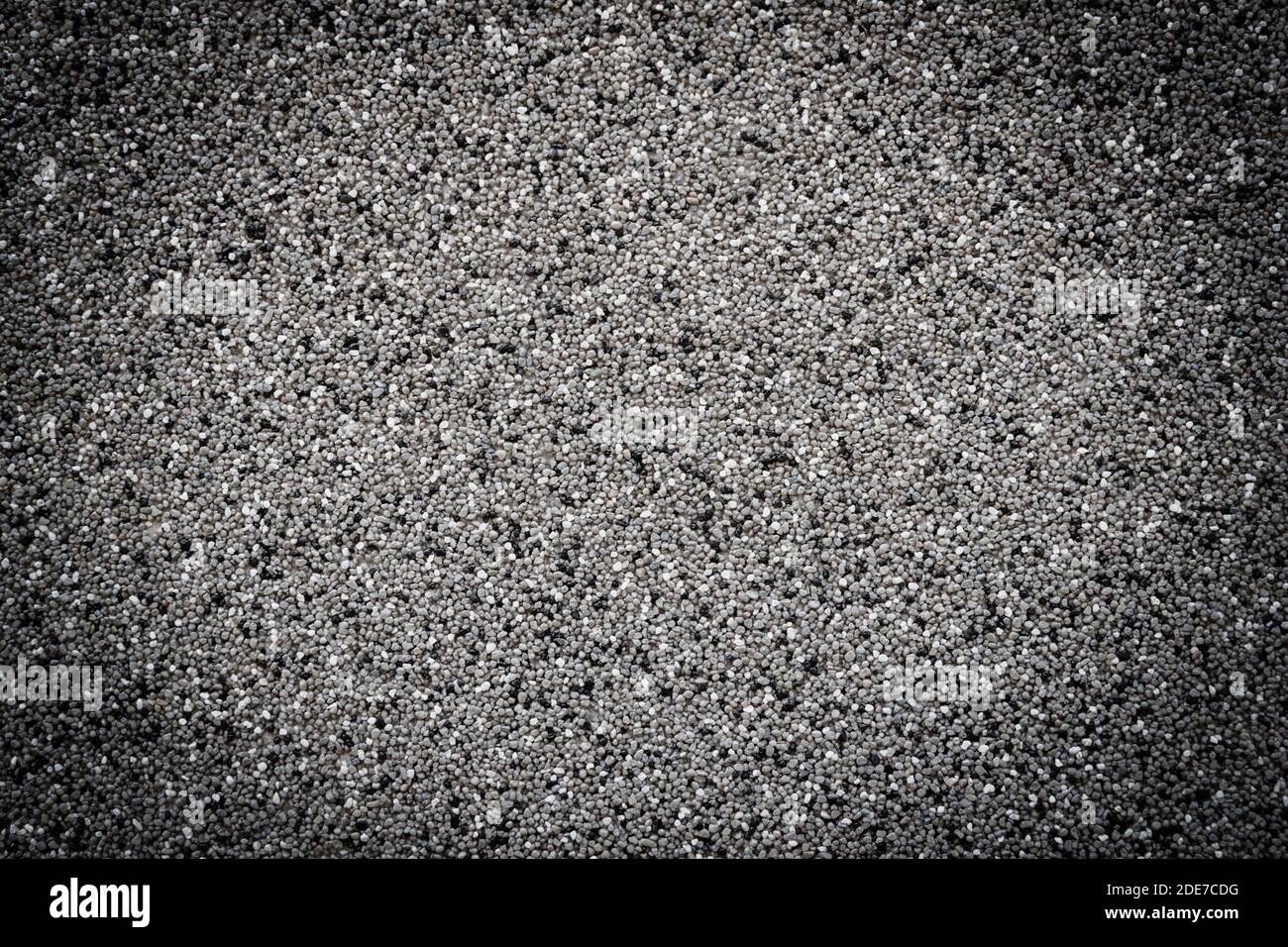 Fine pebbles wall background Stock Photo - Alamy