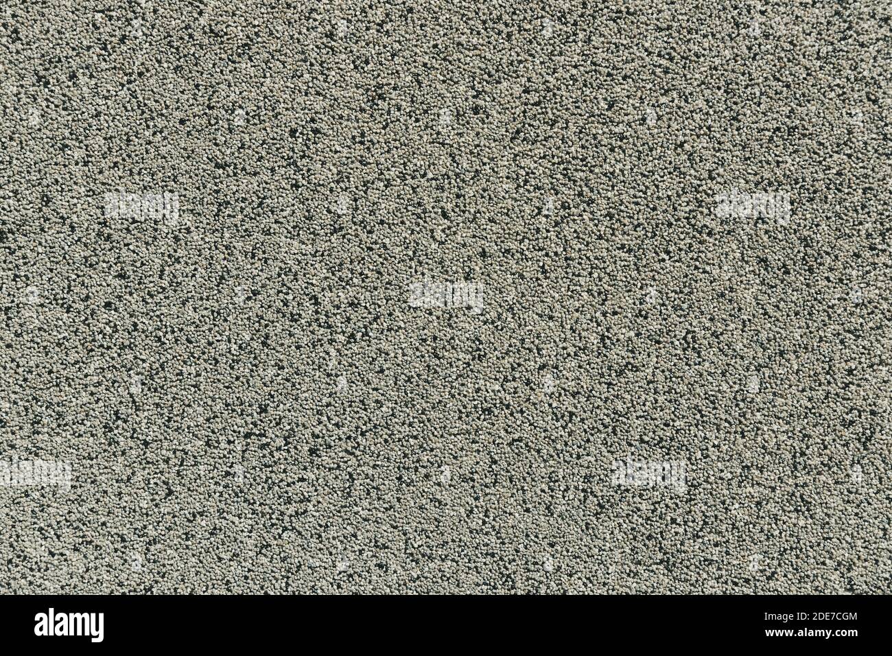 Fine pebbles wall background Stock Photo - Alamy
