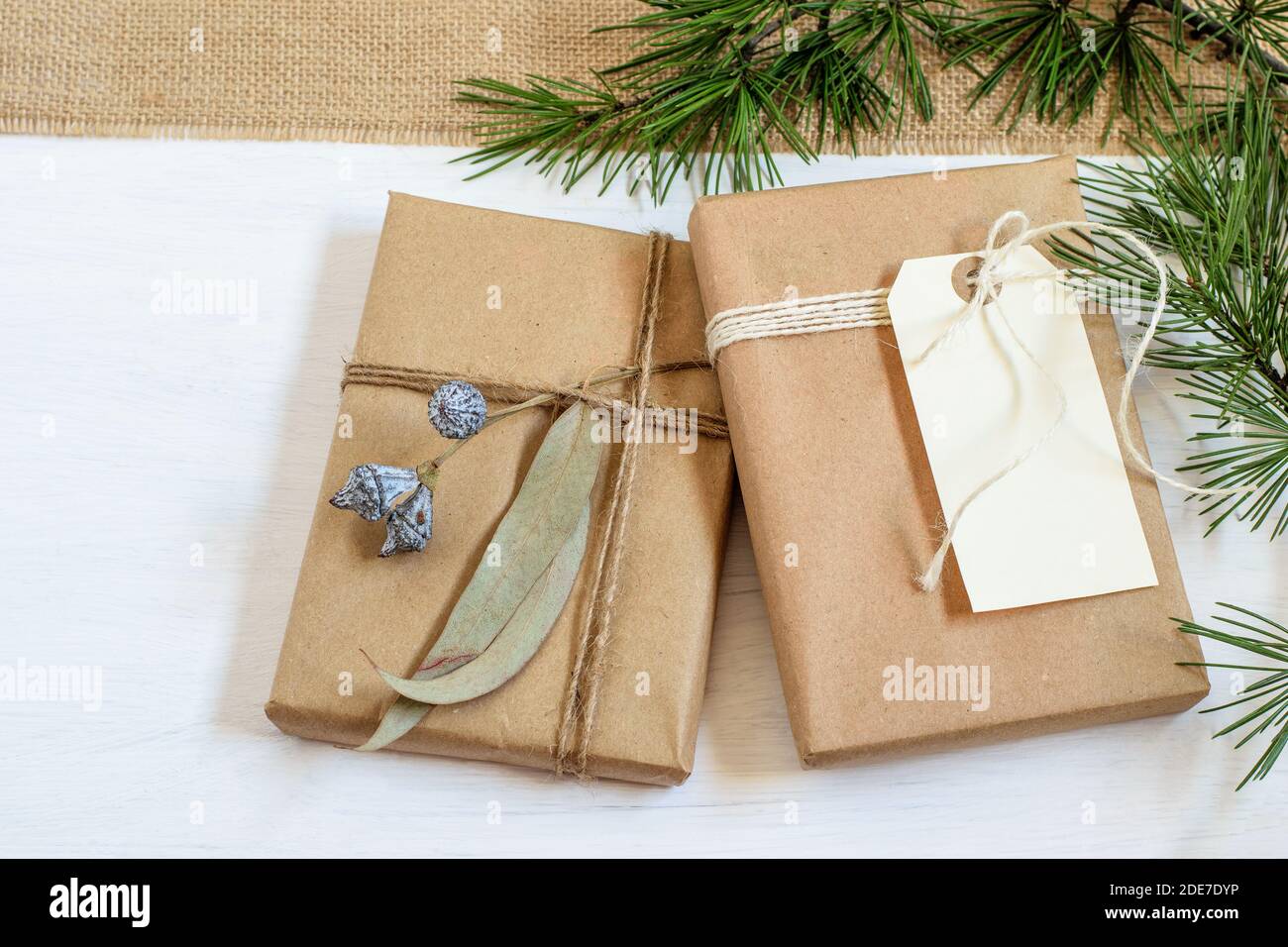 Handmade alternative Christmas gift boxes wrapped in grunge craft paper ...
