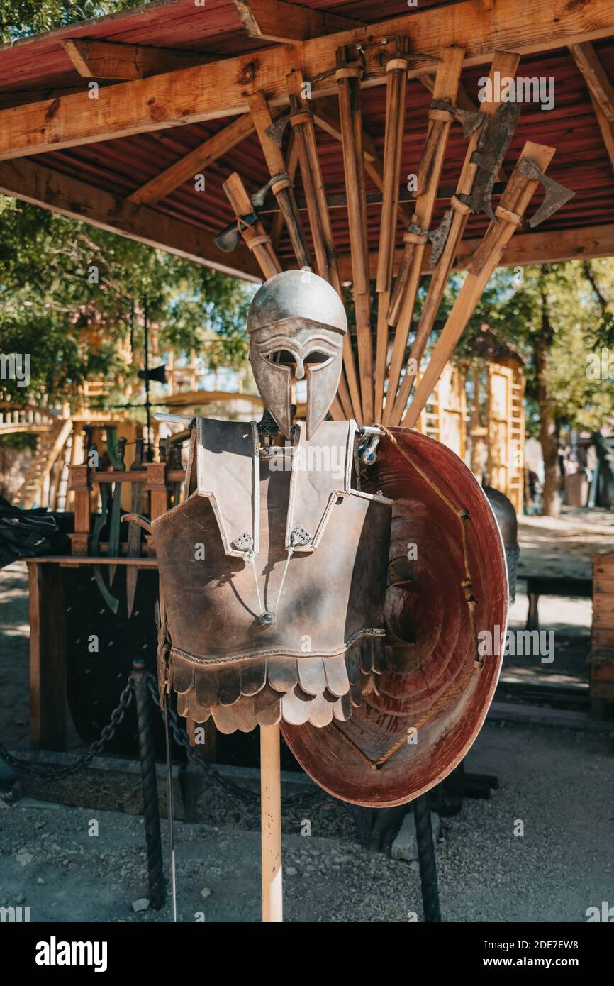 Exhibition of Medieval knightly armor in ancient fortress. Swords ...
