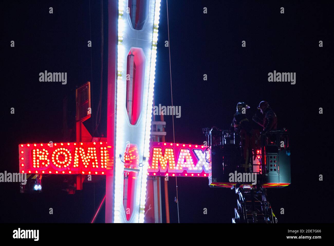 Fire brigade personnel conduct rescue operations after eight people got ...