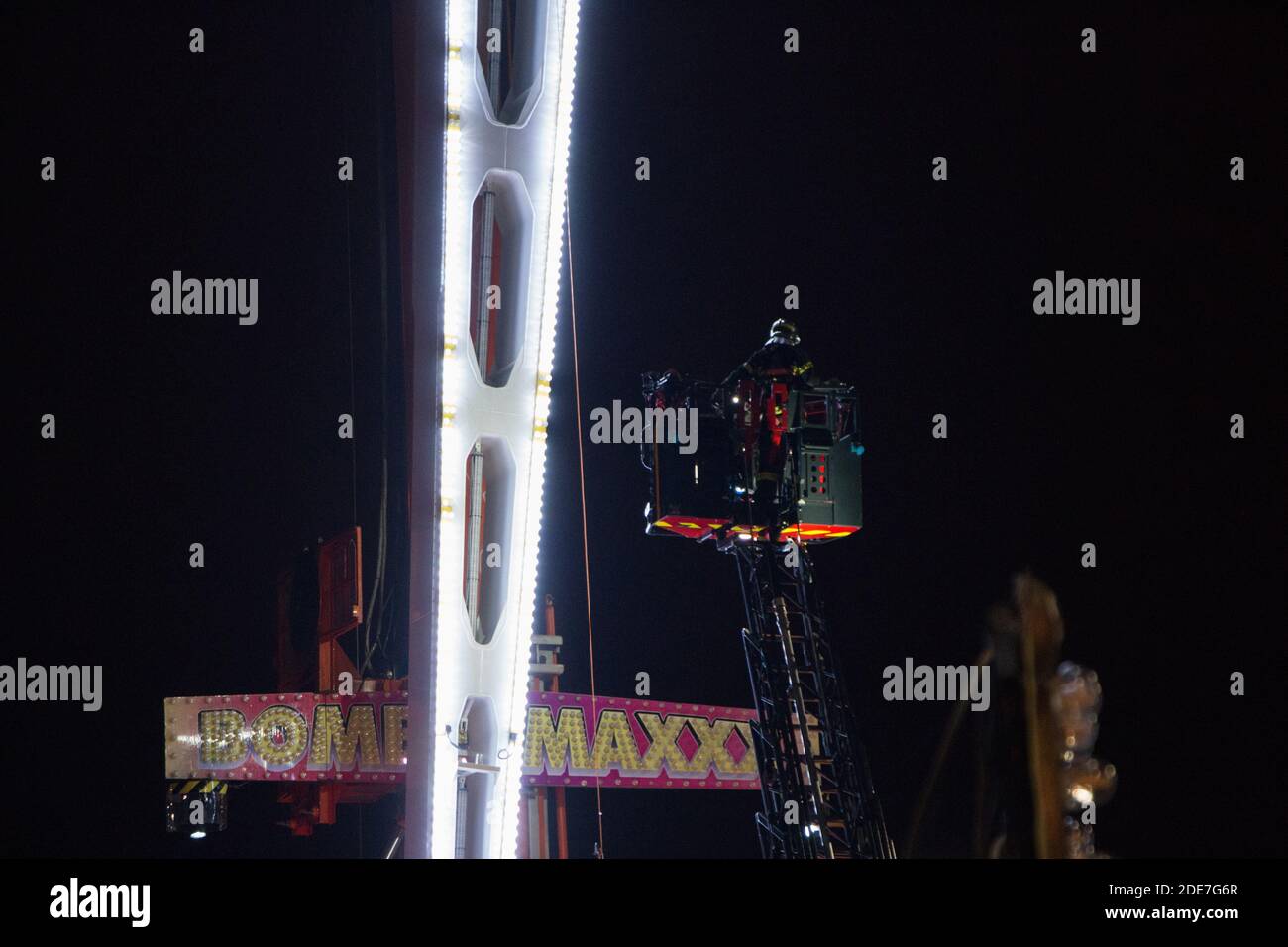 Fire brigade personnel conduct rescue operations after eight people got ...